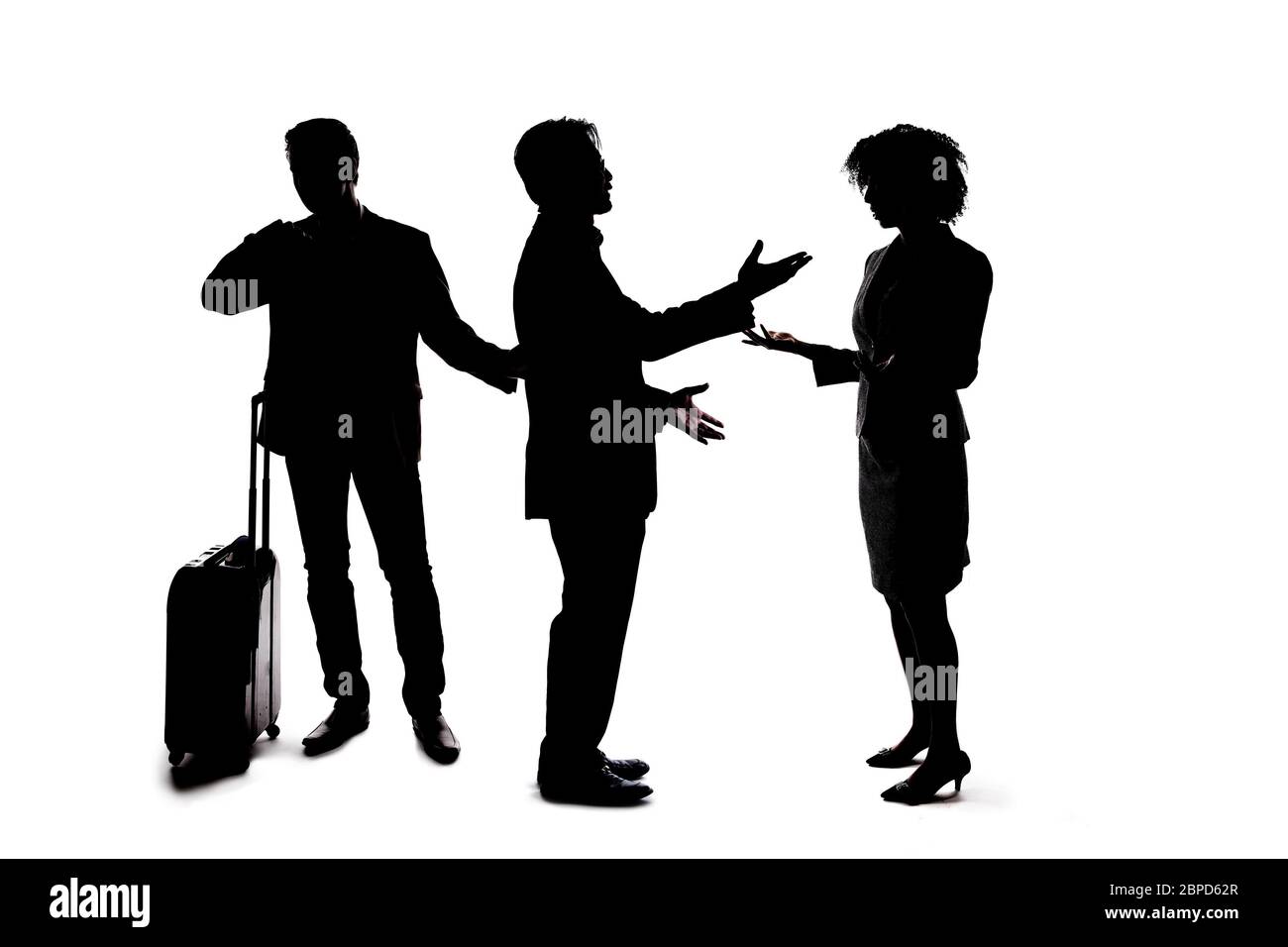 Silhouette of a group of unrecognizable people crowded together ...