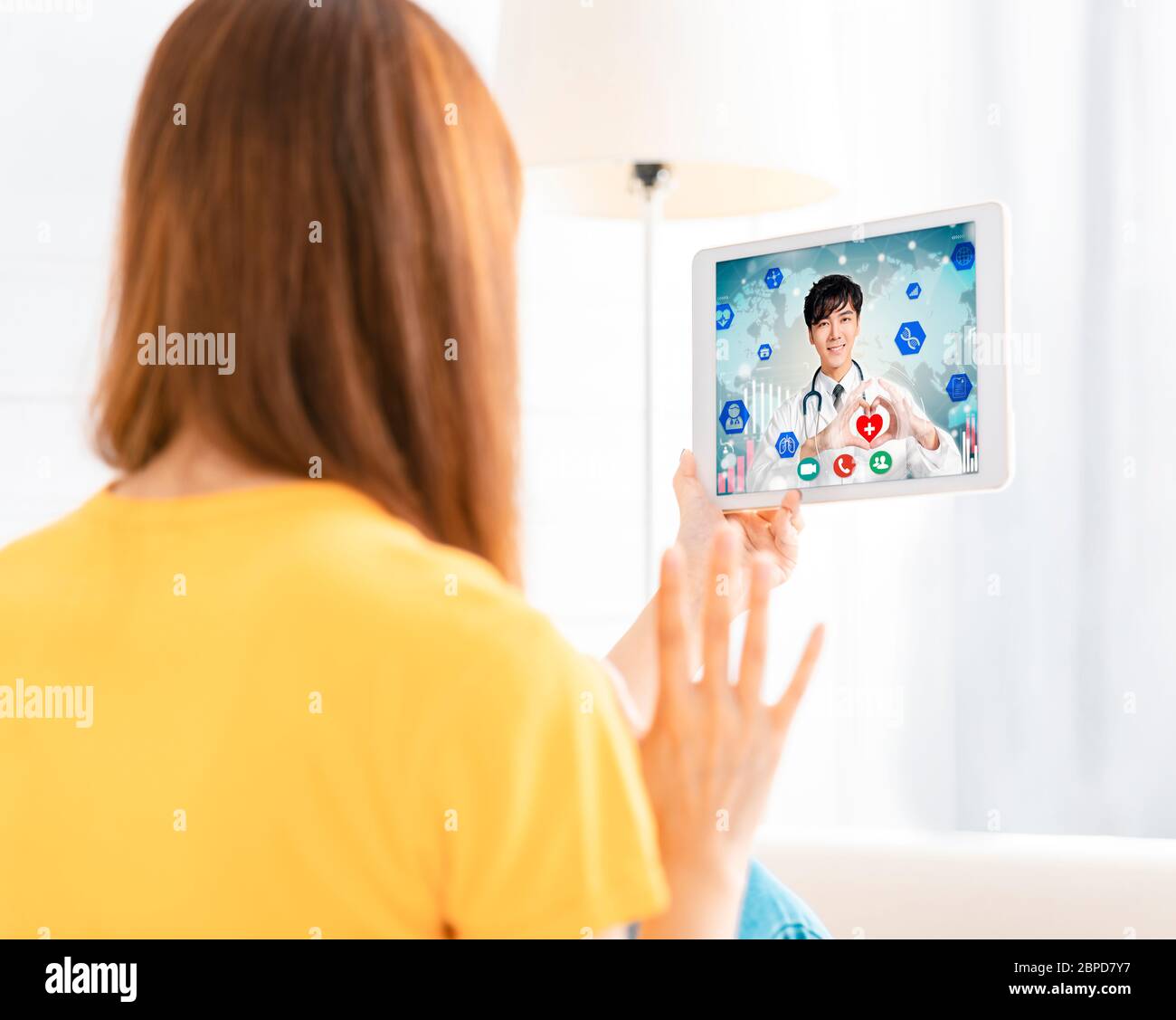 Young woman video chatting on hi-res stock photography and images - Alamy