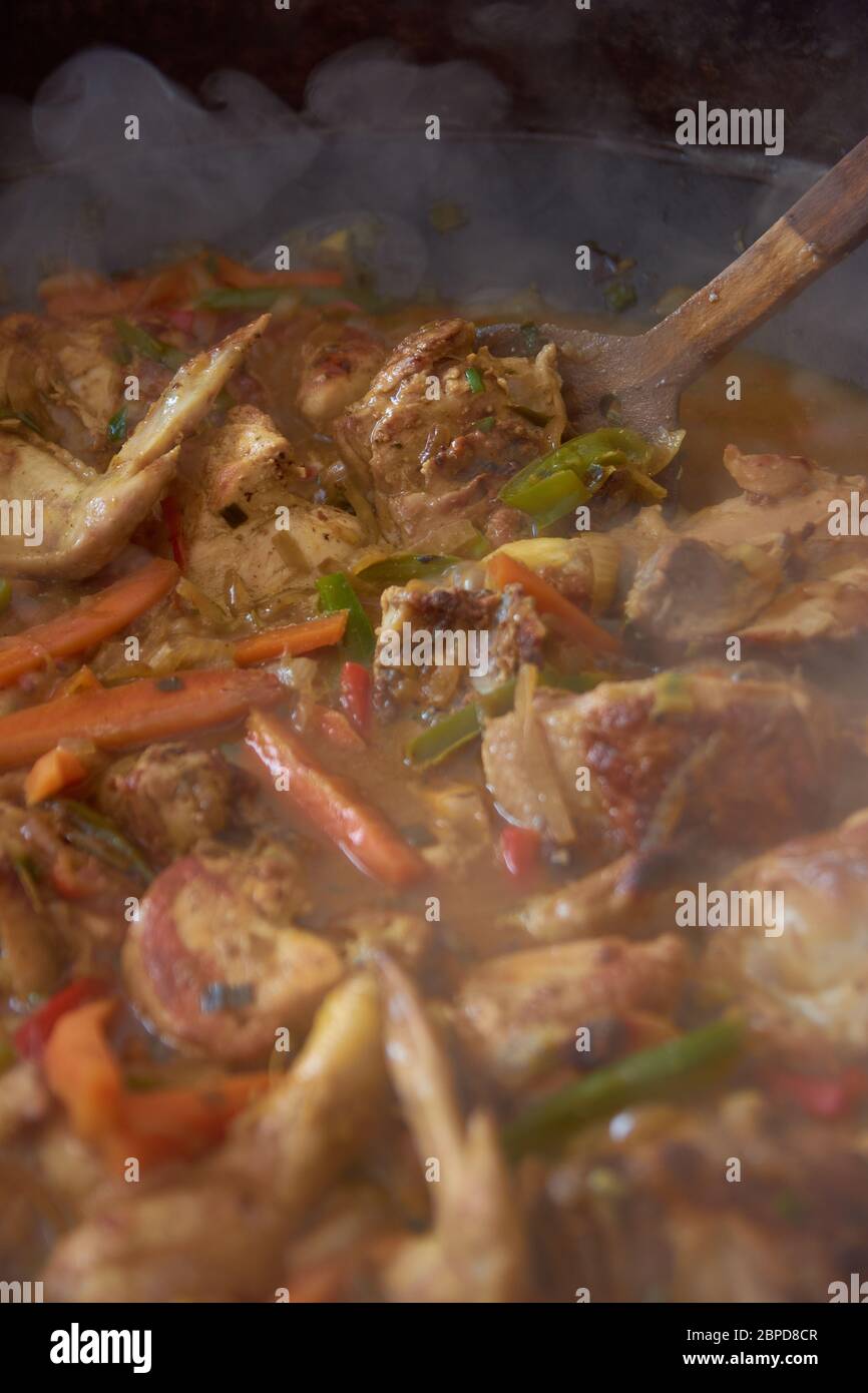 Chicken being cooked hi-res stock photography and images - Alamy