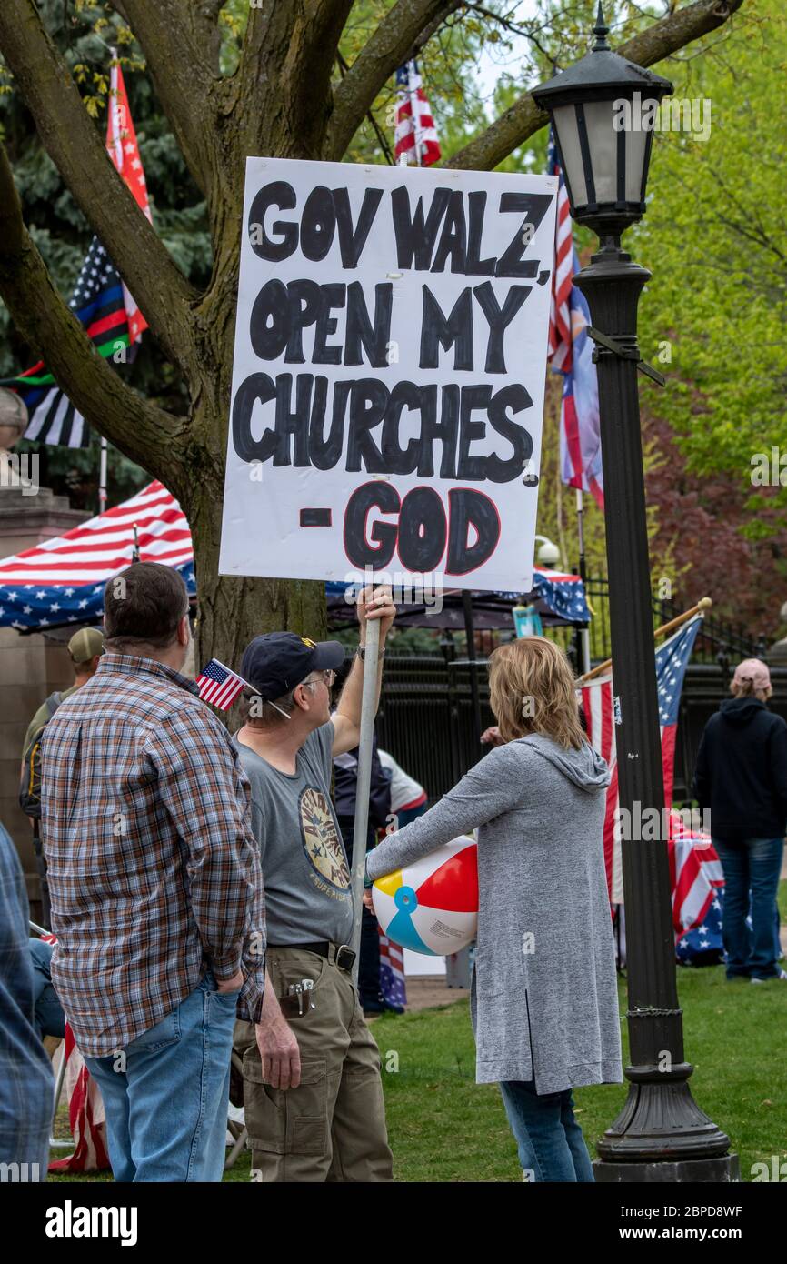 St. Paul, Minnesota. Protest at Governor Tim Walz's mansion to reopen ...