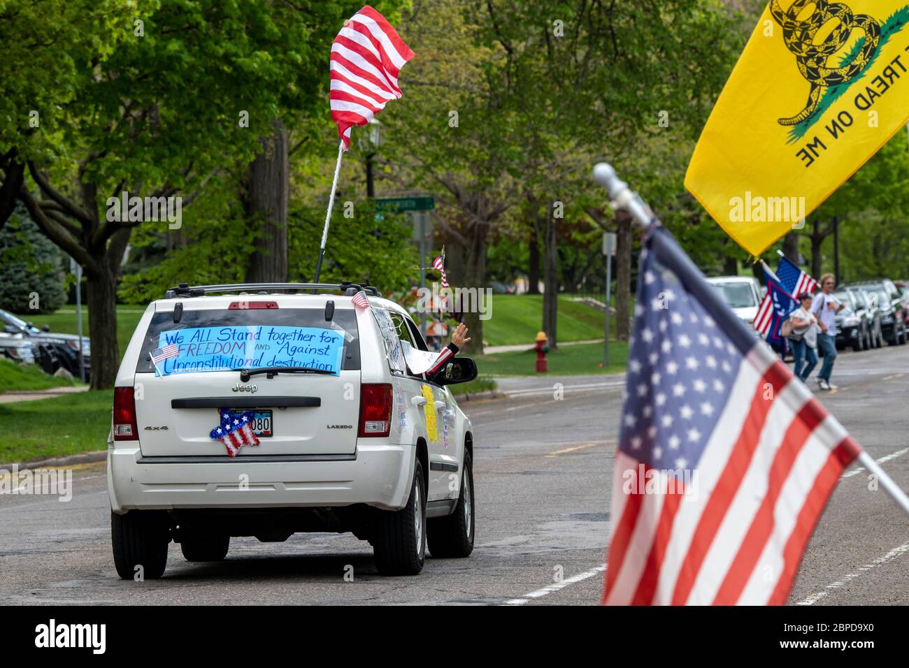 St. Paul, Minnesota. Protest at Governor Tim Walz's mansion to reopen ...