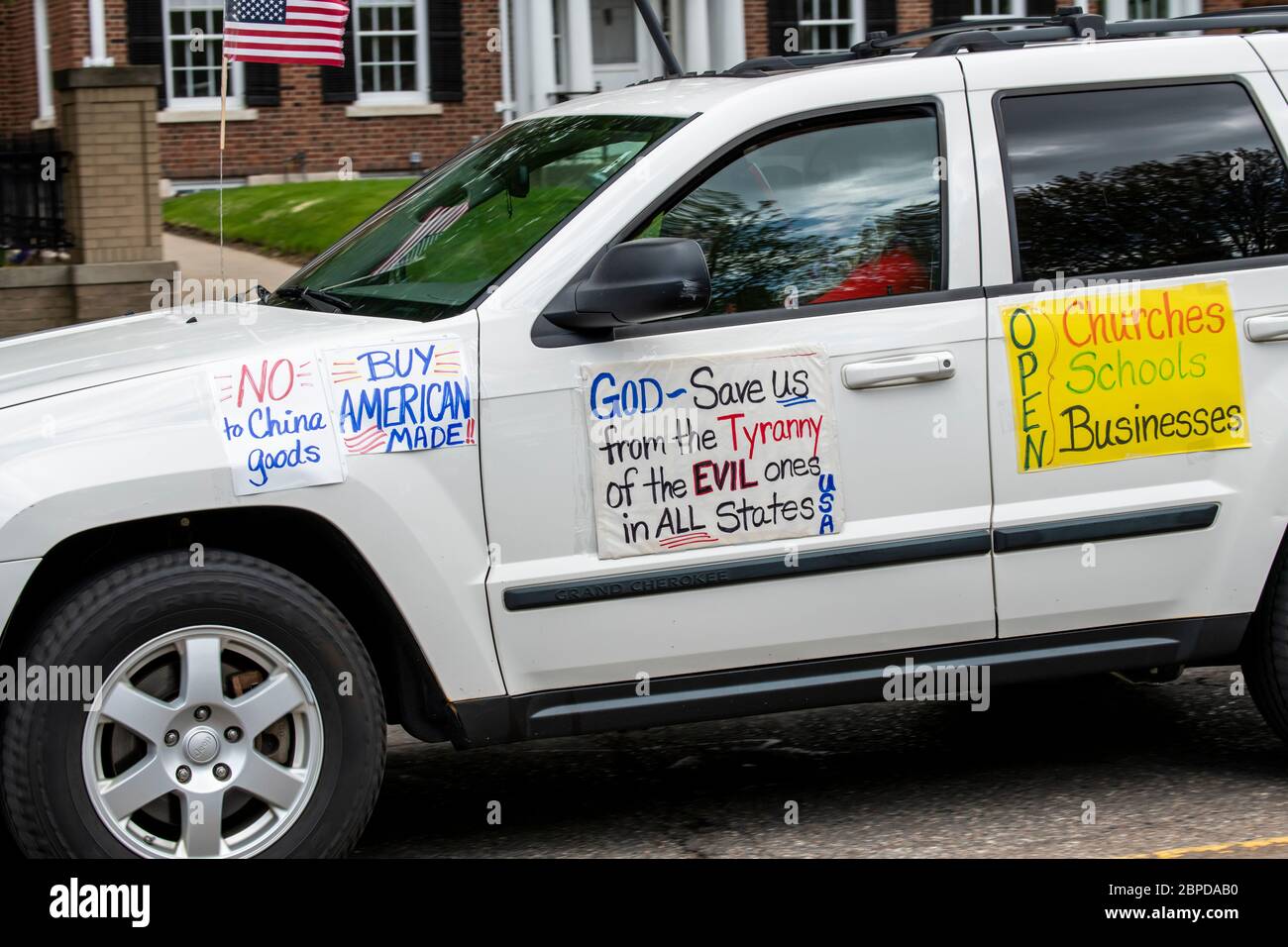 St. Paul, Minnesota. Protest at Governor Tim Walz's mansion to reopen ...