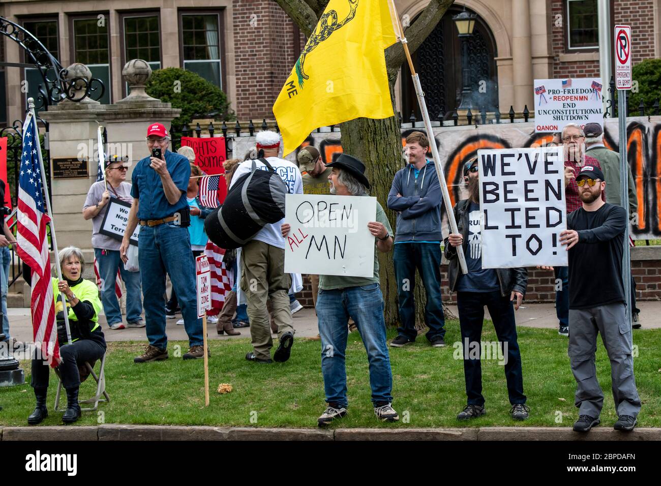 St. Paul, Minnesota. Protest at Governor Tim Walz's mansion to reopen ...