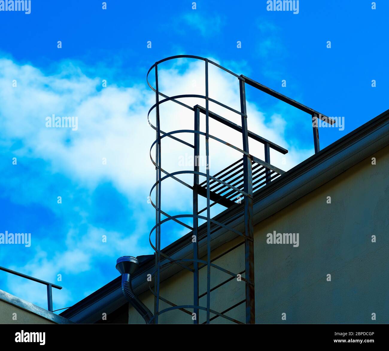 Roof safety ladder architecture background Stock Photo - Alamy