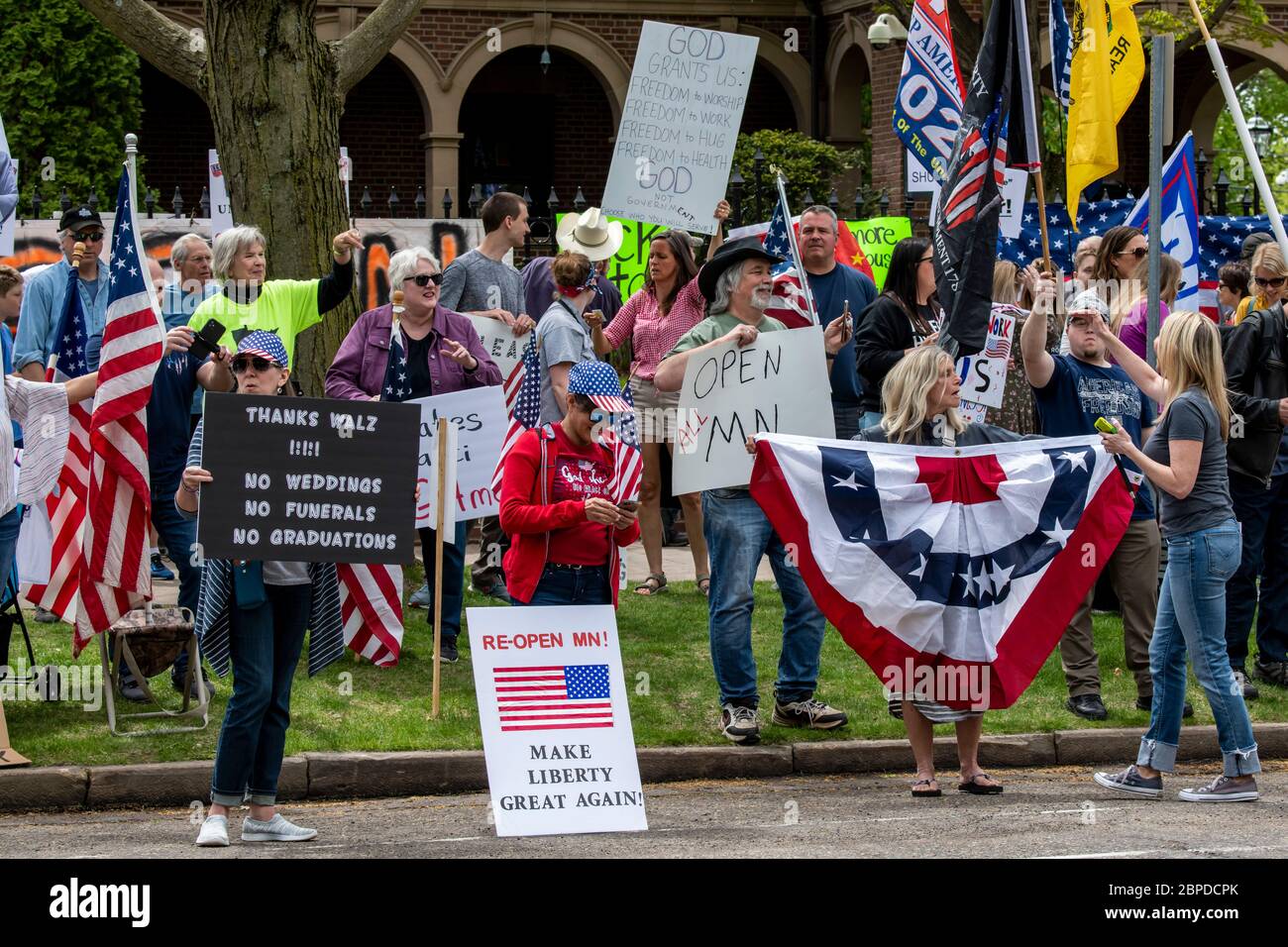 St. Paul, Minnesota. Protest at Governor Tim Walz's mansion to reopen ...