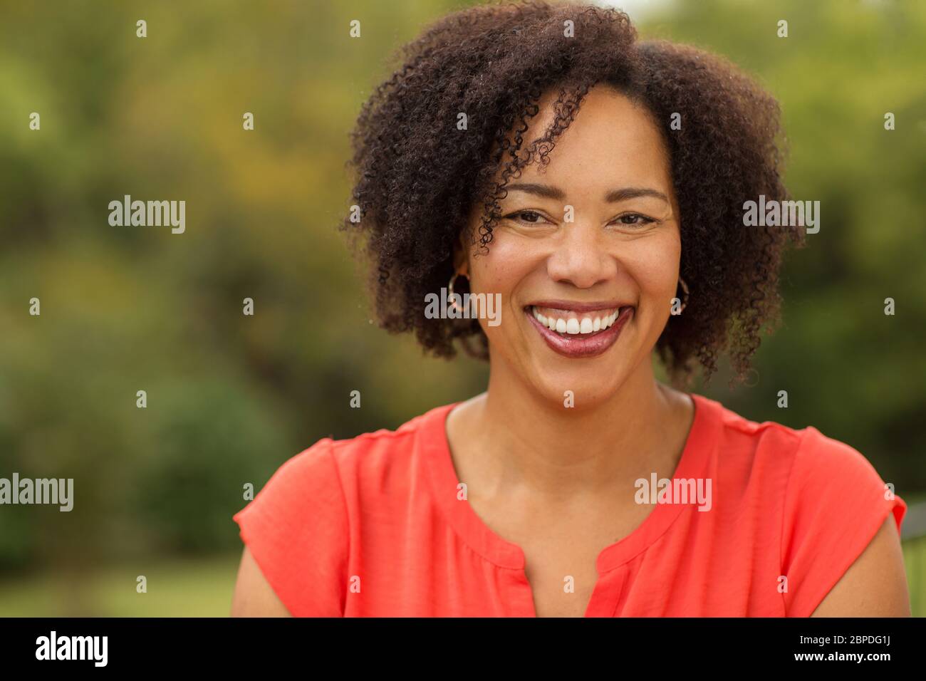 Mature woman cold weather outside happy hi-res stock photography and ...