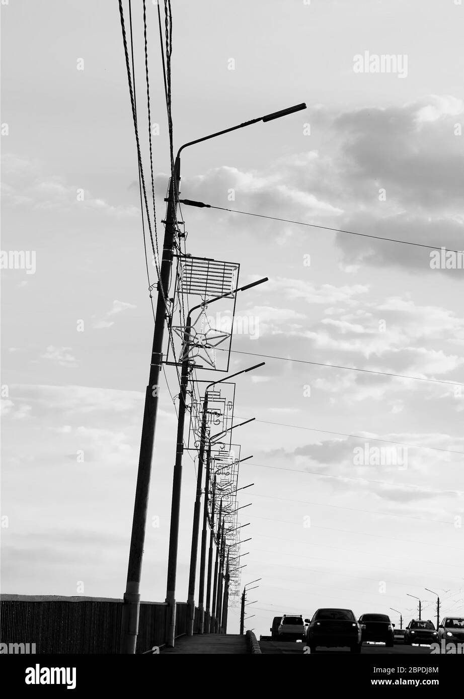 Lamp posts at countryside road background Stock Photo - Alamy