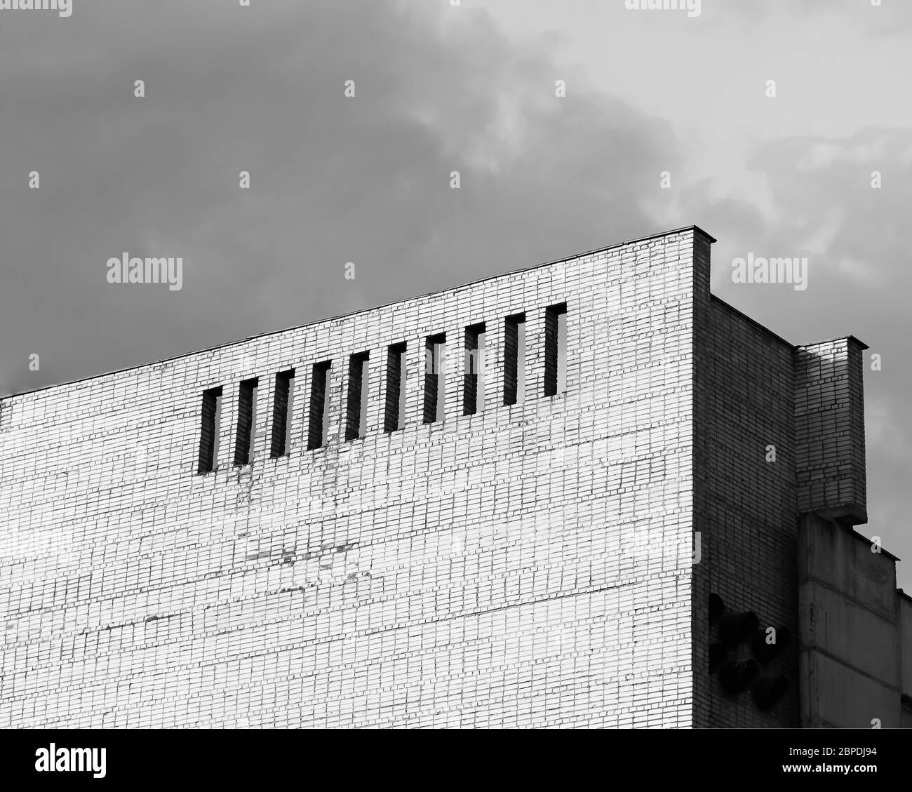 Multiple embrasure windows on brick buildings background Stock Photo ...