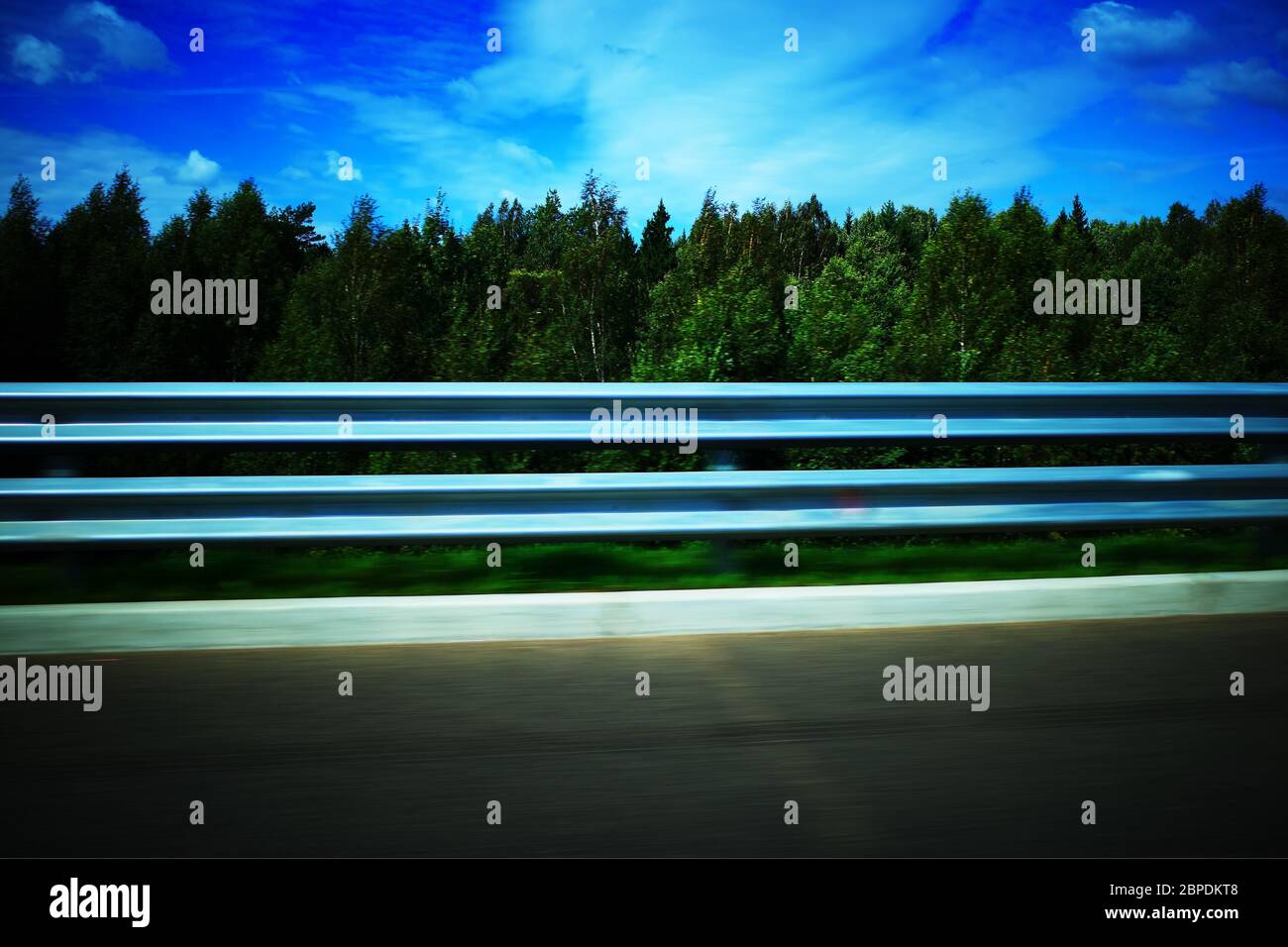 Bump stop on highway road transportation background Stock Photo - Alamy