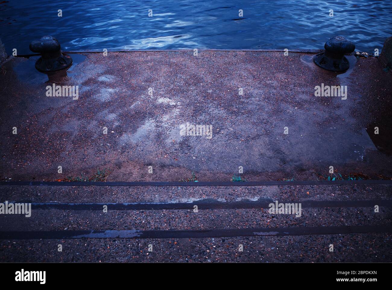 Concrete river quay navigation background Stock Photo - Alamy