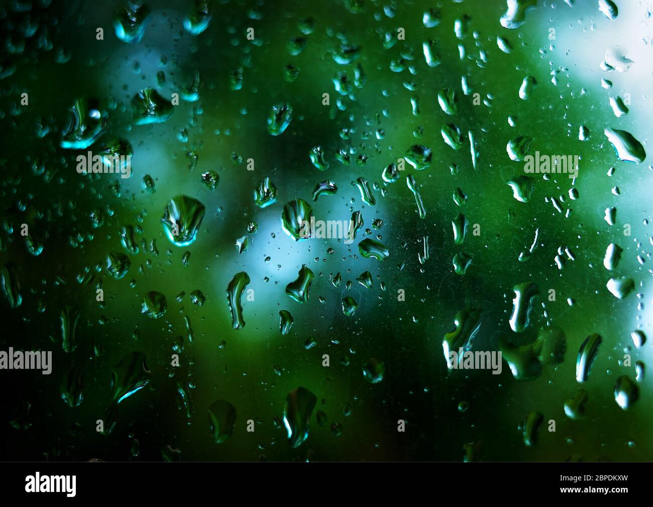 Dramatic raindrops on the window glass background Stock Photo - Alamy