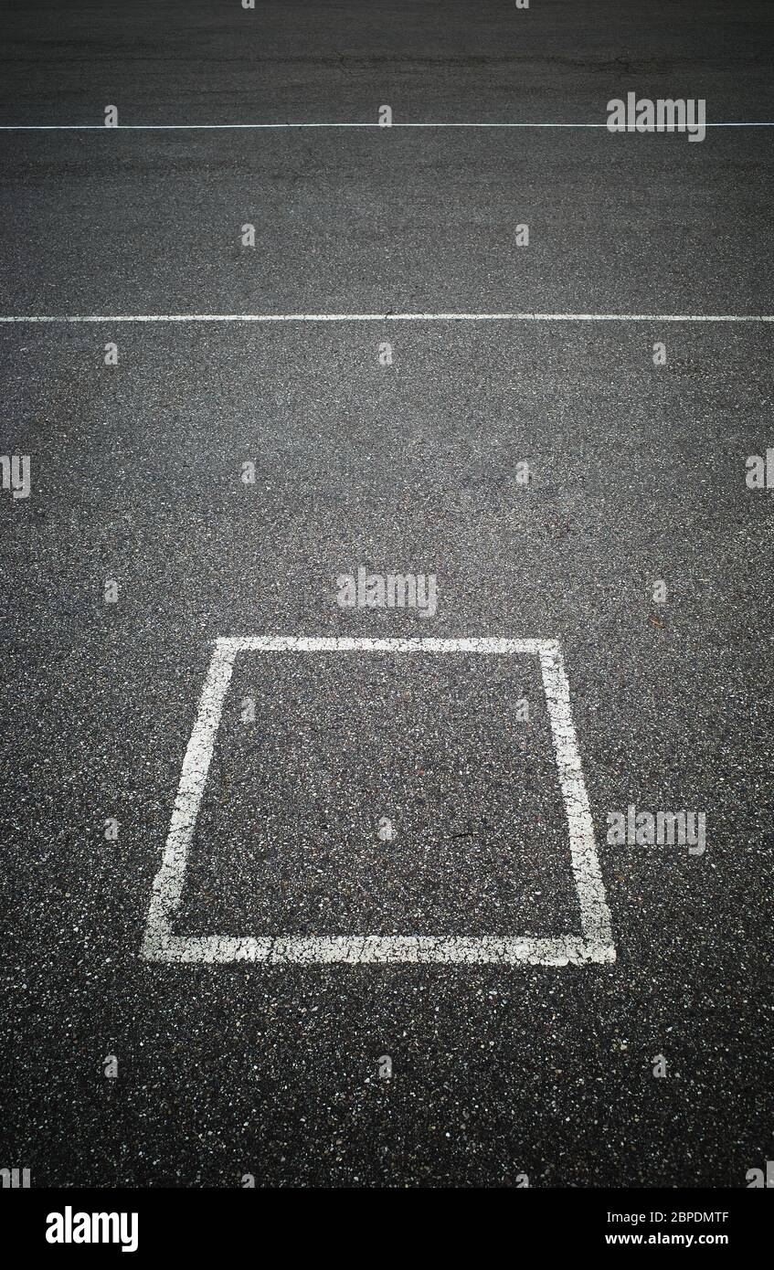 Simple square marking on car parking zone background Stock Photo - Alamy