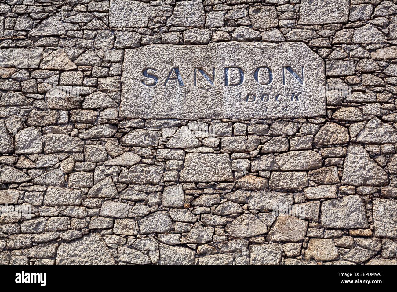 Sign on the old stone wall of the Sandon Dock, part of the Port of ...