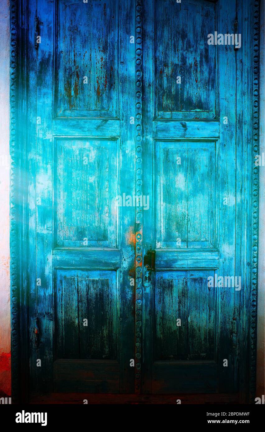 Locked vintage cyan door architecture background Stock Photo - Alamy