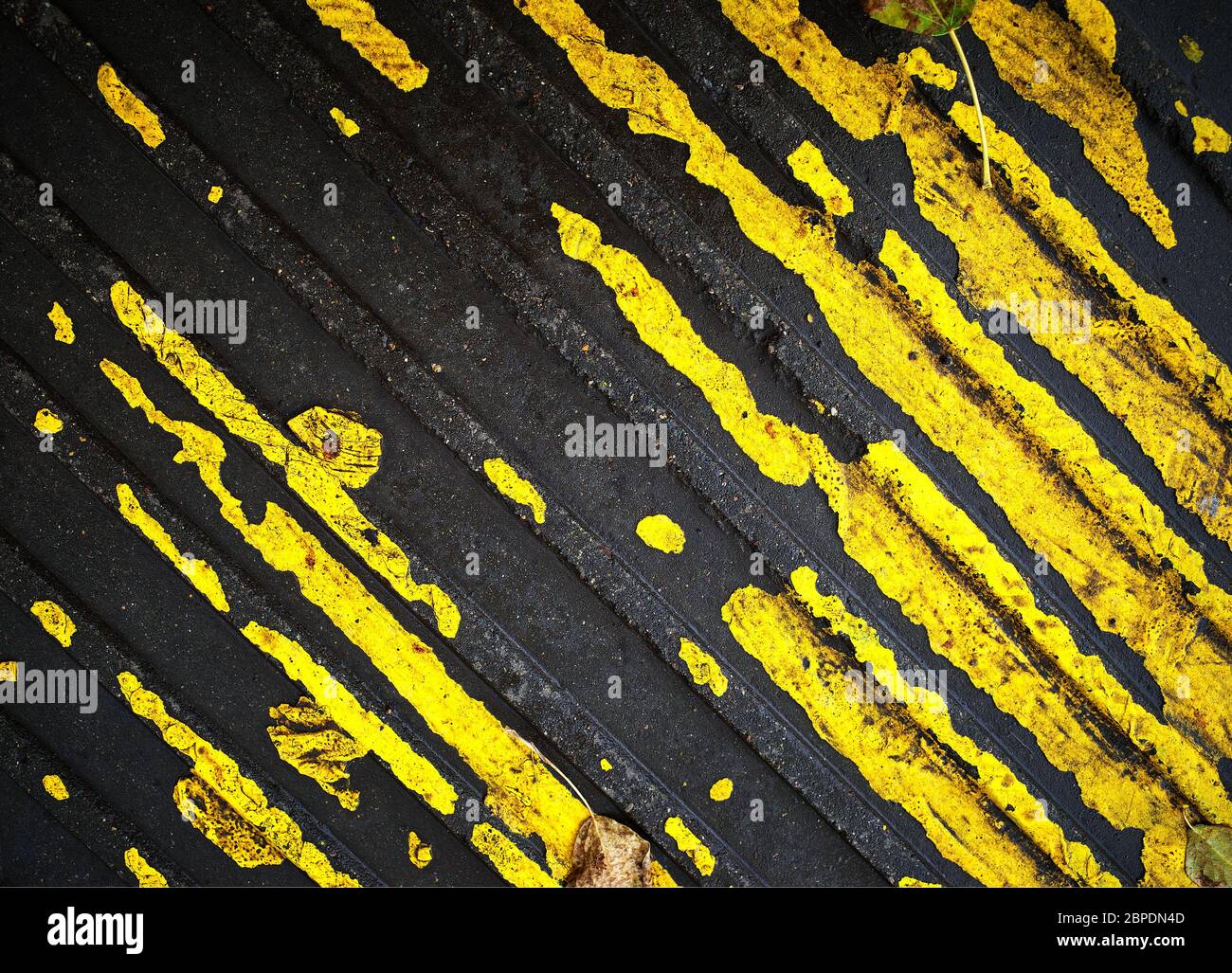 Diagonal yellow painted pavement texture backdrop Stock Photo - Alamy
