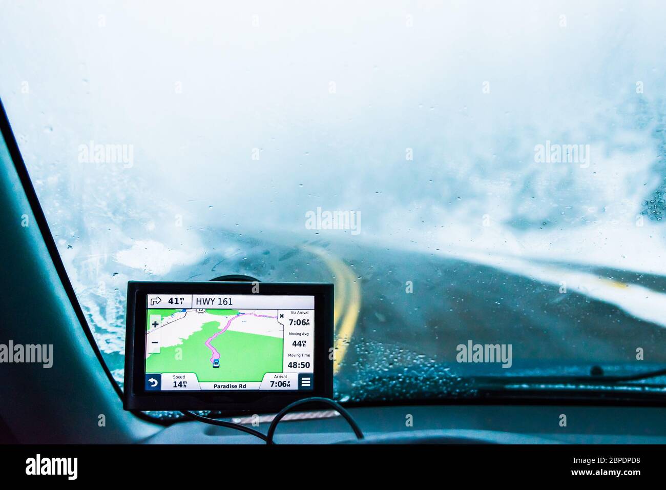 use navigator on the road with snow when driving in snow mountain Stock ...