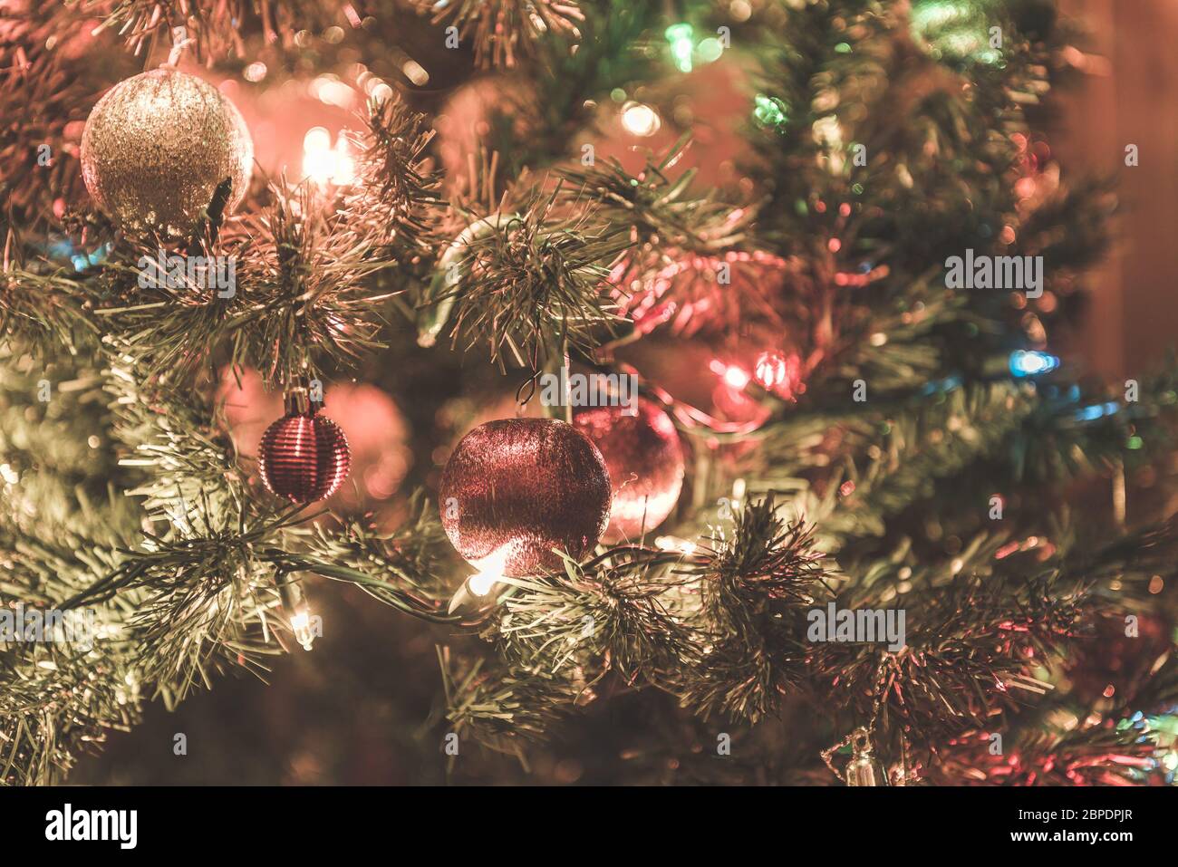Christmas tree with many ornaments with led lighting bulb Stock Photo ...