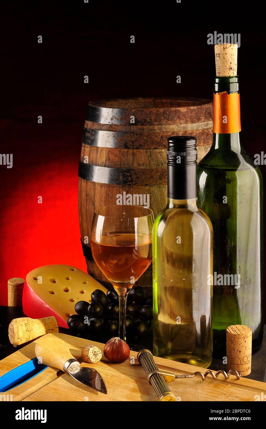Glass and wine bottle on a studio shot Stock Photo - Alamy