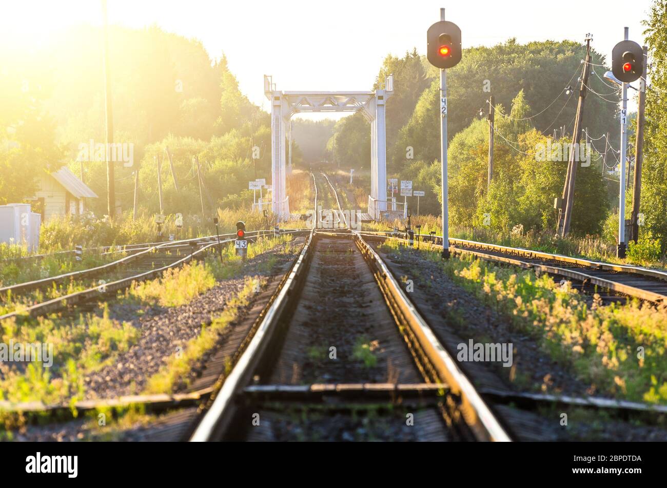Railroad against beautiful sky at sunset. Rural landscape with railway ...