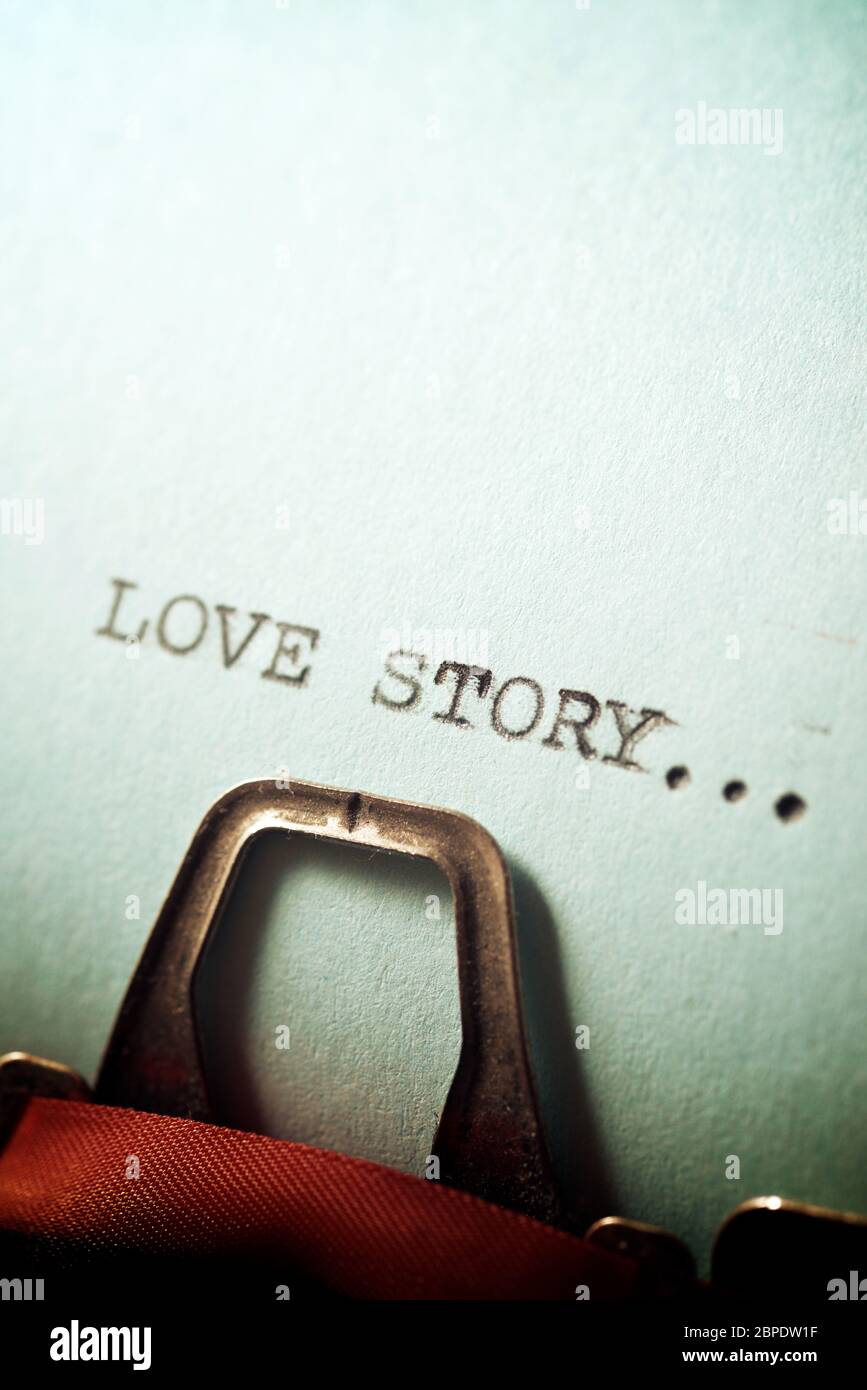 Love story text written on a paper Stock Photo - Alamy