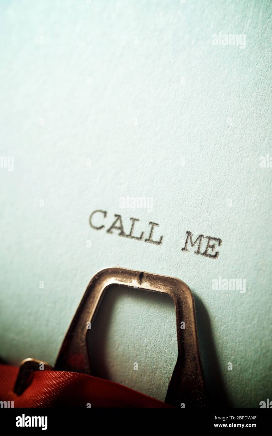 Call me text written on a paper Stock Photo - Alamy