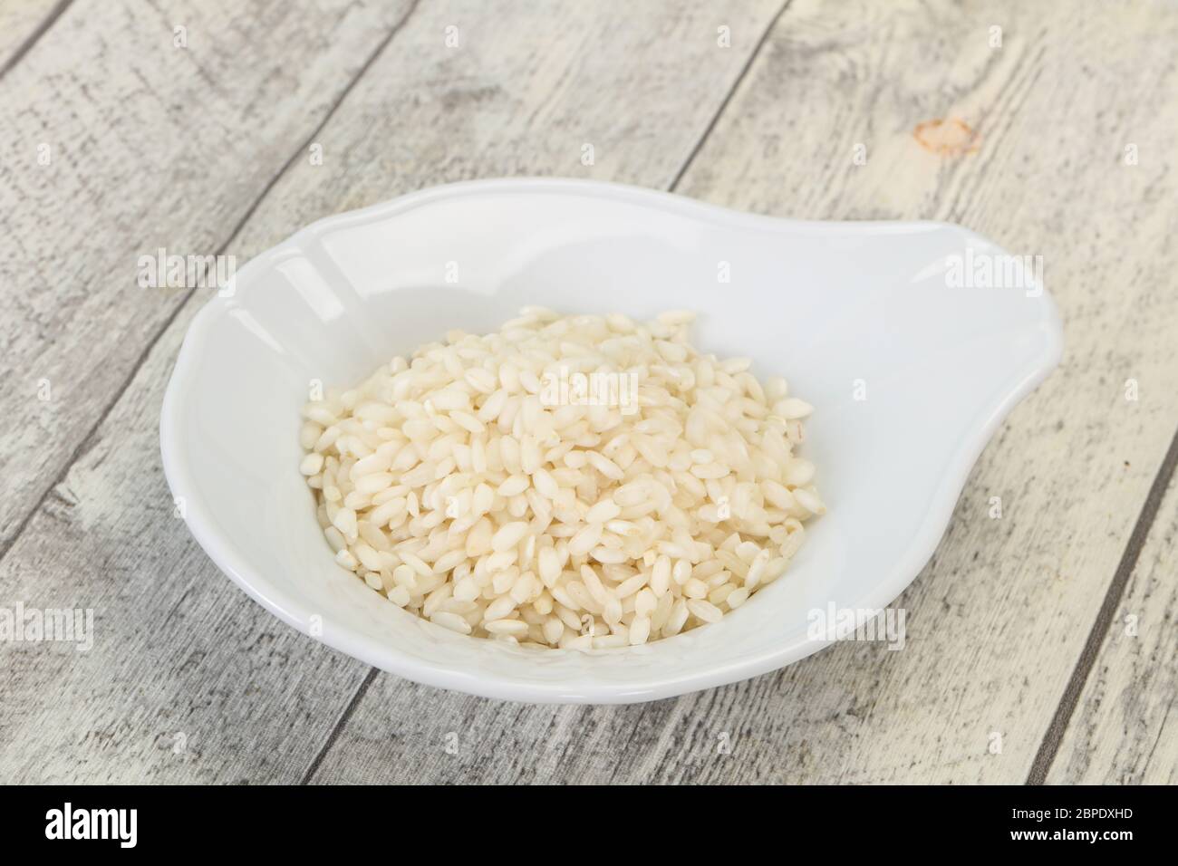 Raw Arborio rice for Italian risotto Stock Photo - Alamy