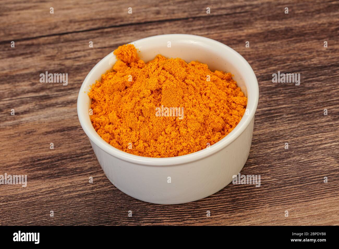 Tumeric - curcuma powder in the bowl Stock Photo - Alamy