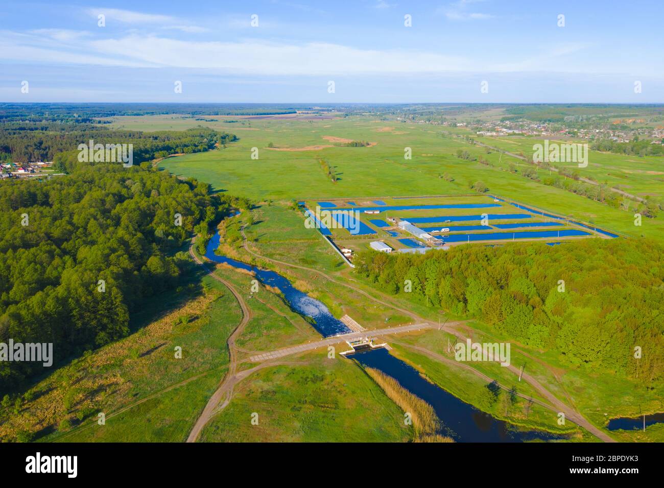 Aquaculture fisheries. Fish farming in the pond system. Small ponds ...