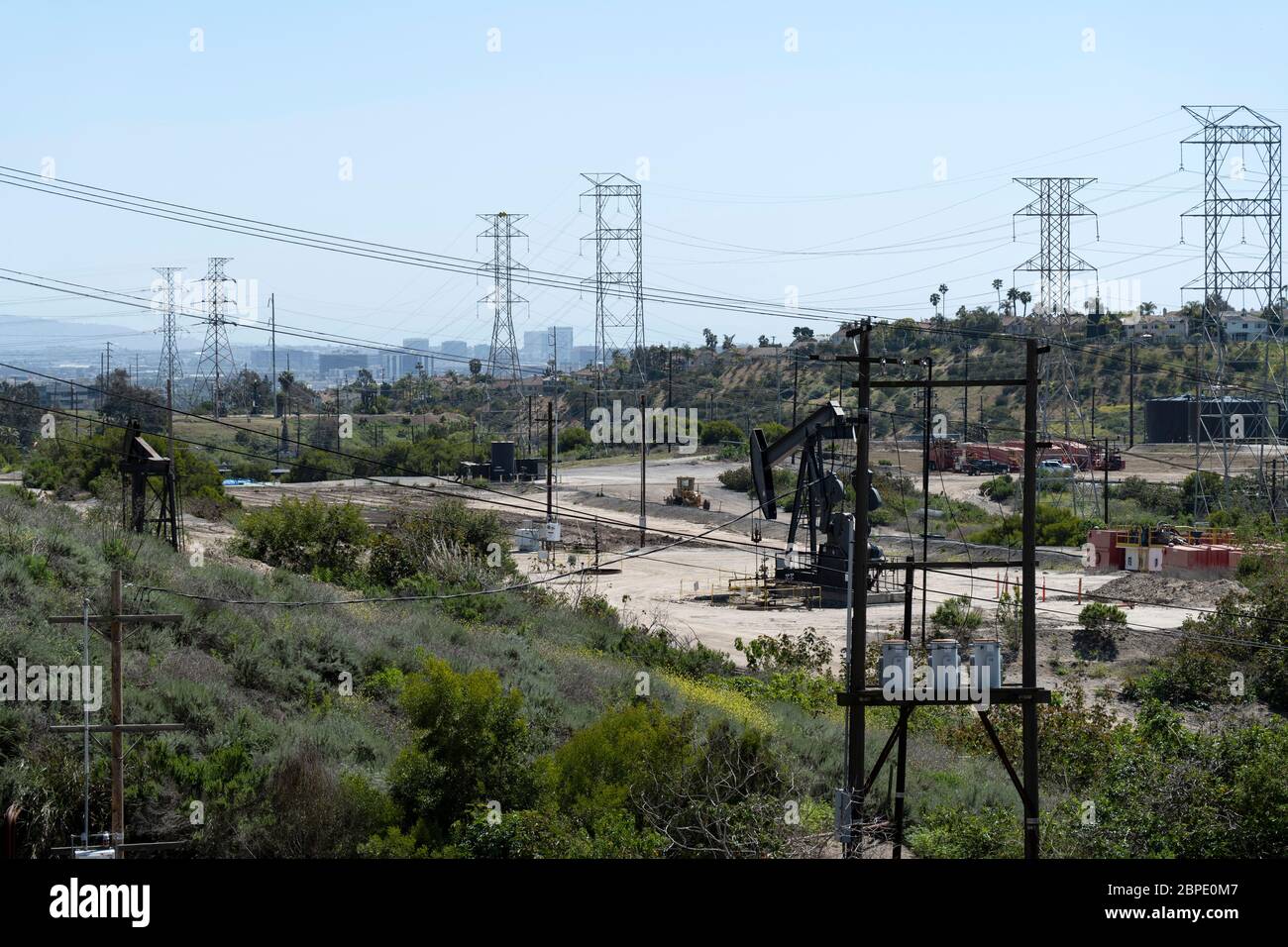 A large oil field with the Los Angeles skyline in the distance Stock ...