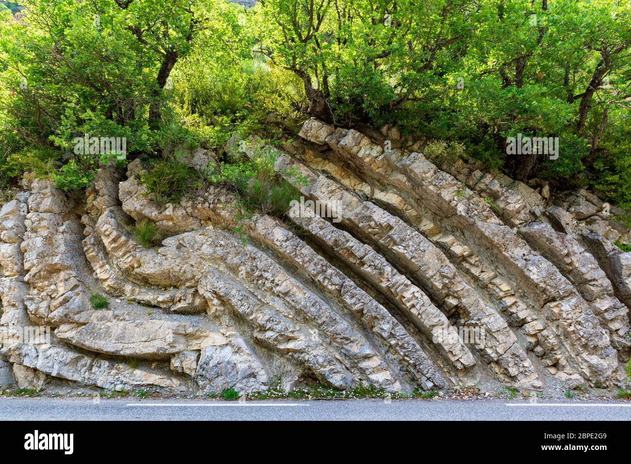 Unusual stone layers. Volcanic or sedimentary rocks in France Stock ...