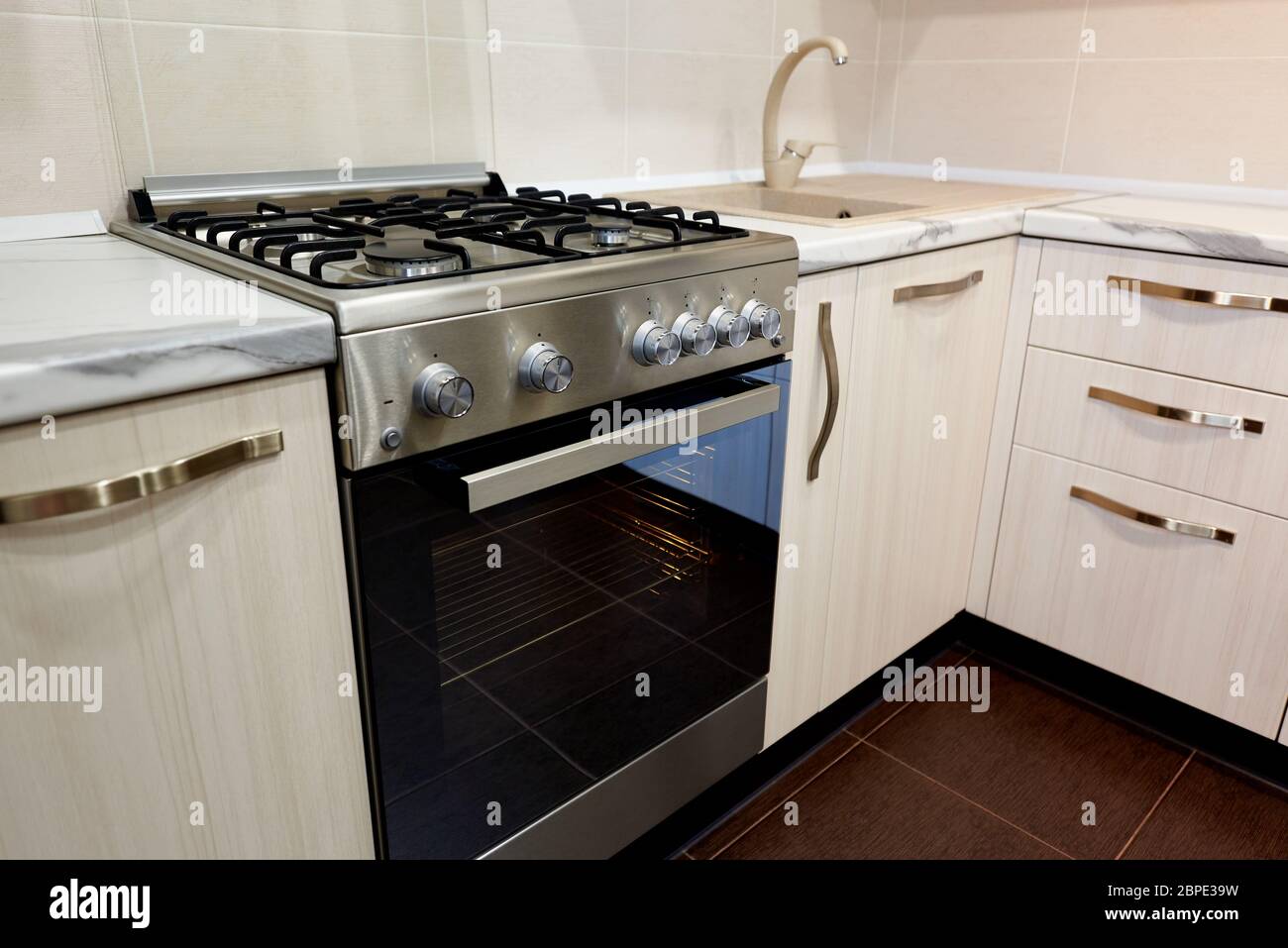 Oven on an empty kitchen in an apartment Stock Photo - Alamy