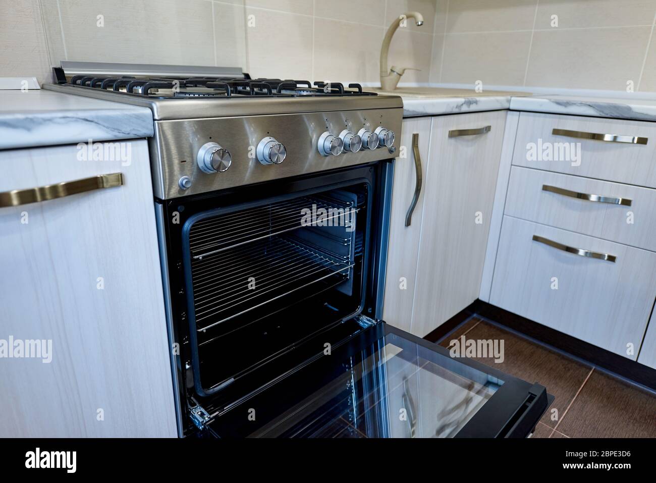 Open oven in an empty kitchen in an apartment Stock Photo - Alamy