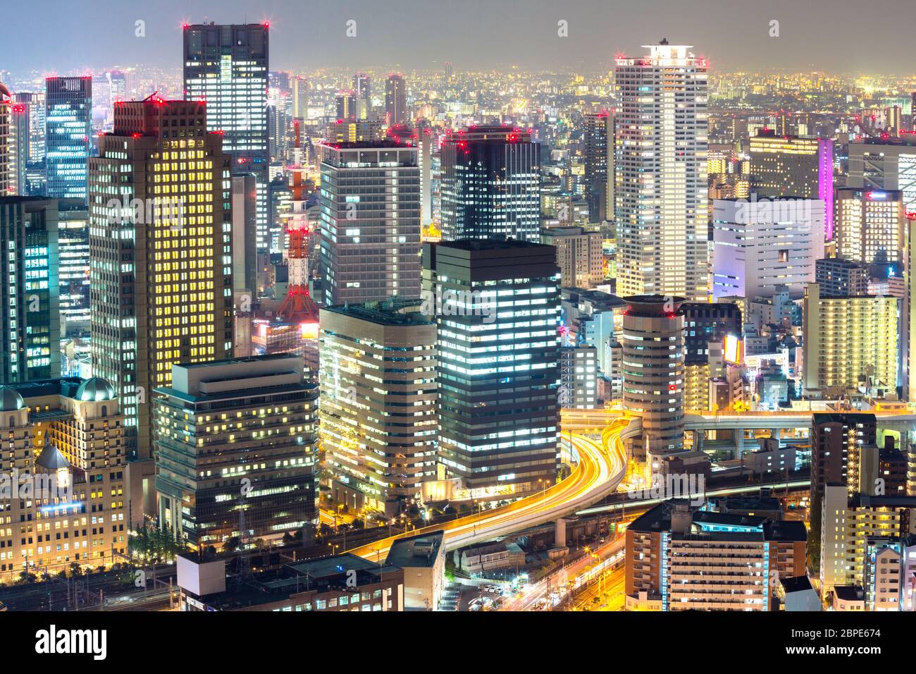 Osaka skyline and skyscraper building at night Japan Stock Photo - Alamy