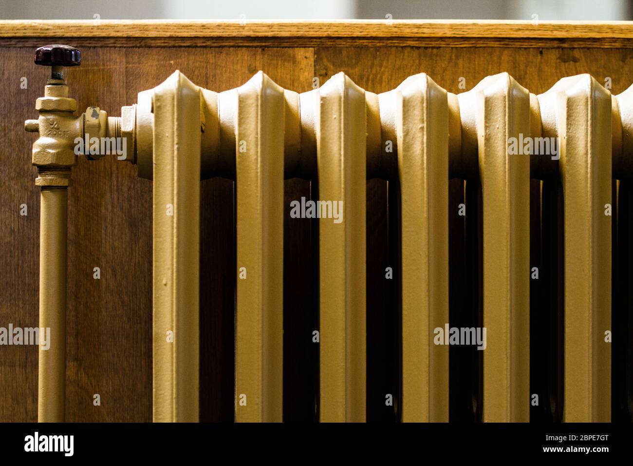 Beige Water Radiator Heater on a Wall Stock Photo - Alamy