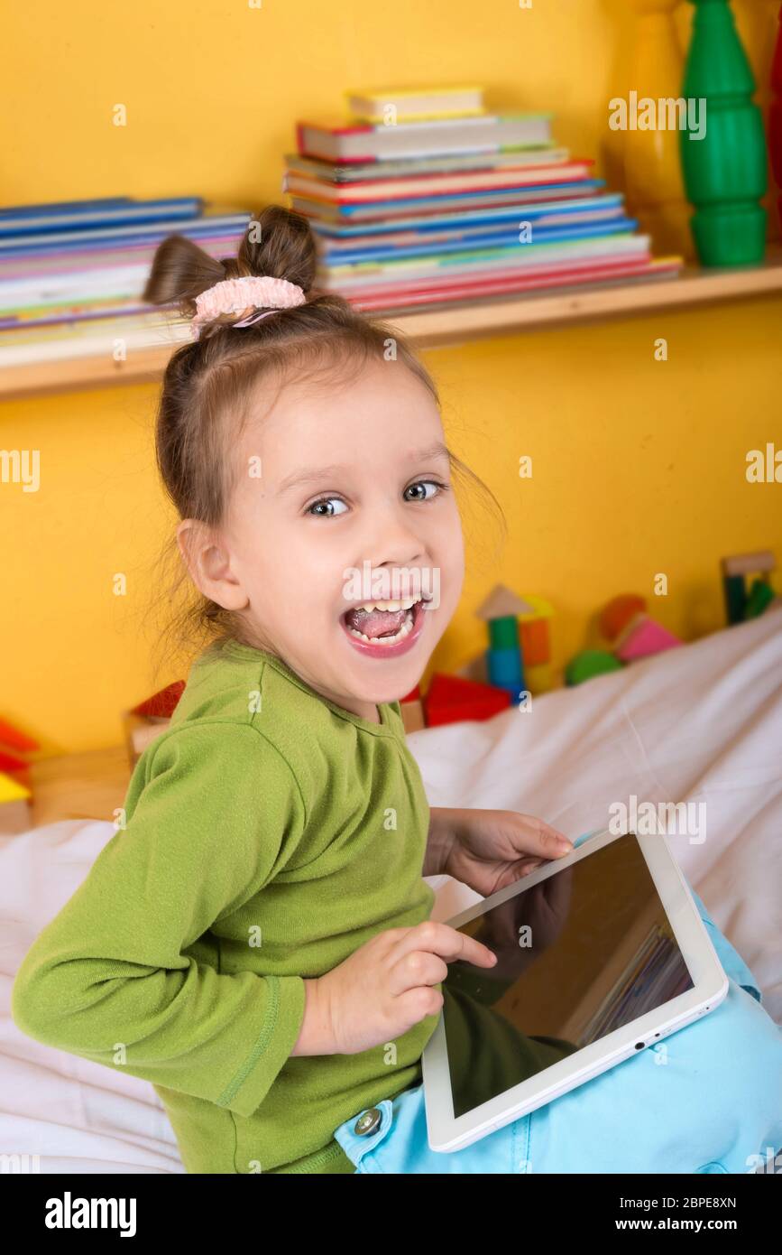 small girls with tablet Stock Photo - Alamy