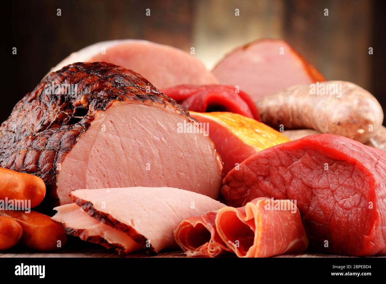 Assorted meat products including ham and sausages Stock Photo - Alamy