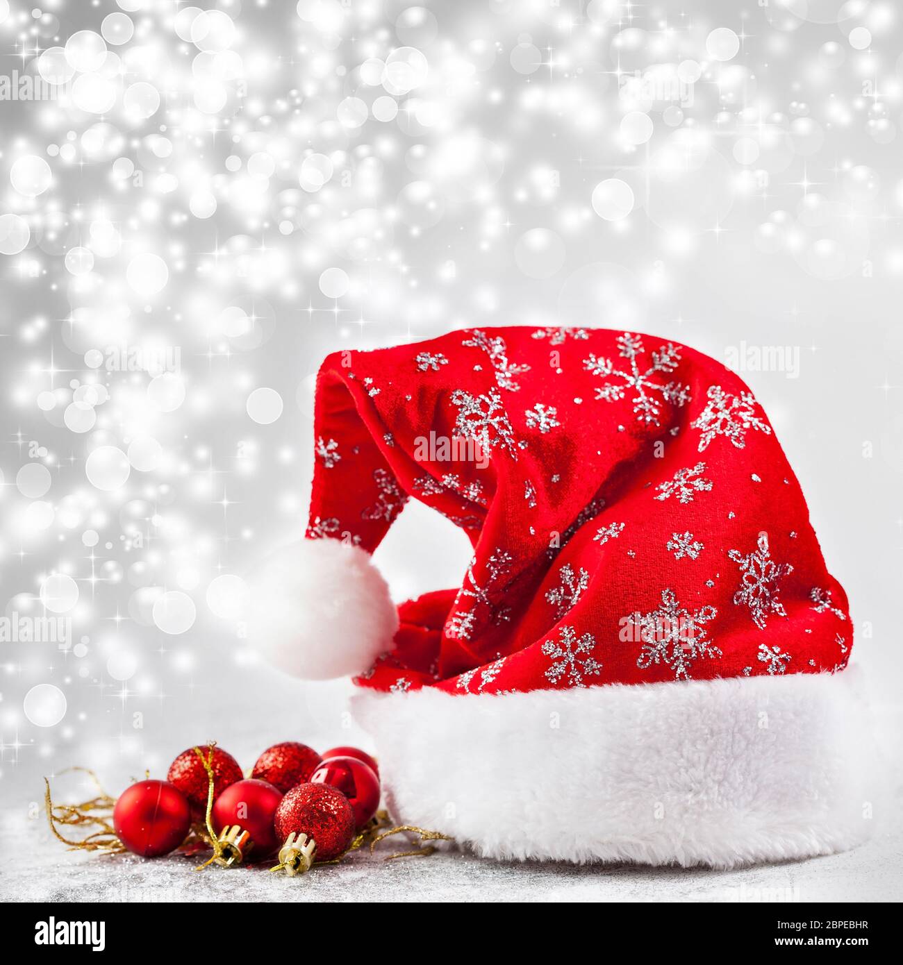 Christmas balls and ornaments in front of glittering background Stock ...