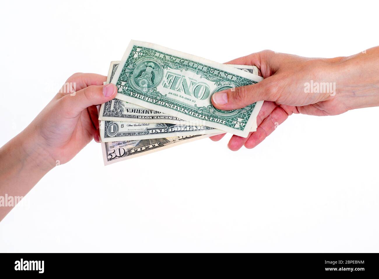 two hands with money in front of white background Stock Photo - Alamy