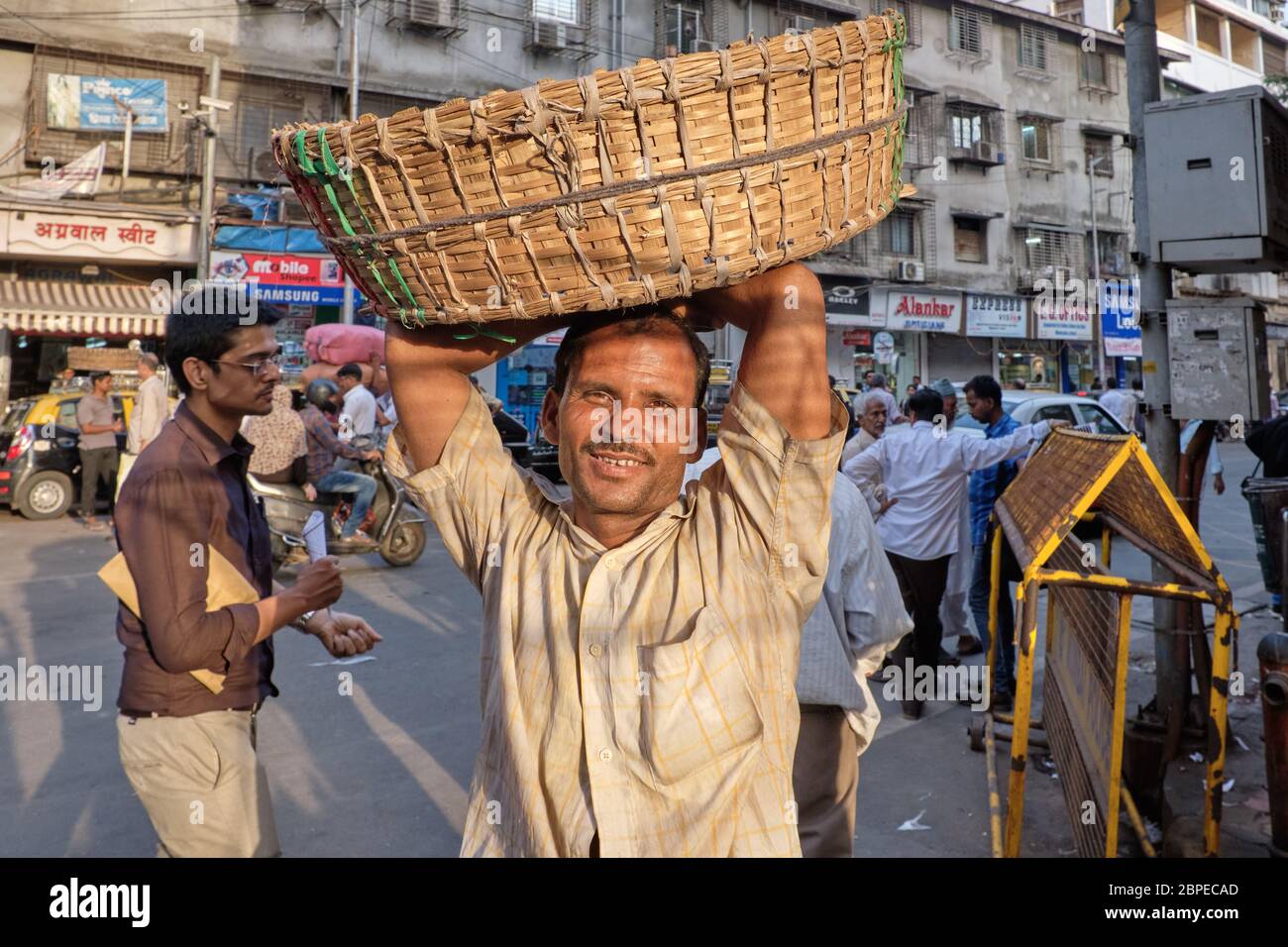 Indian man porter carrying hi-res stock photography and images - Alamy