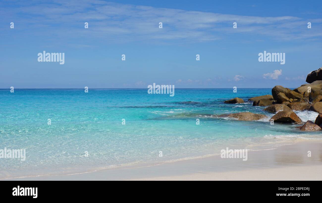 natural tropical beach on praslin island Stock Photo - Alamy
