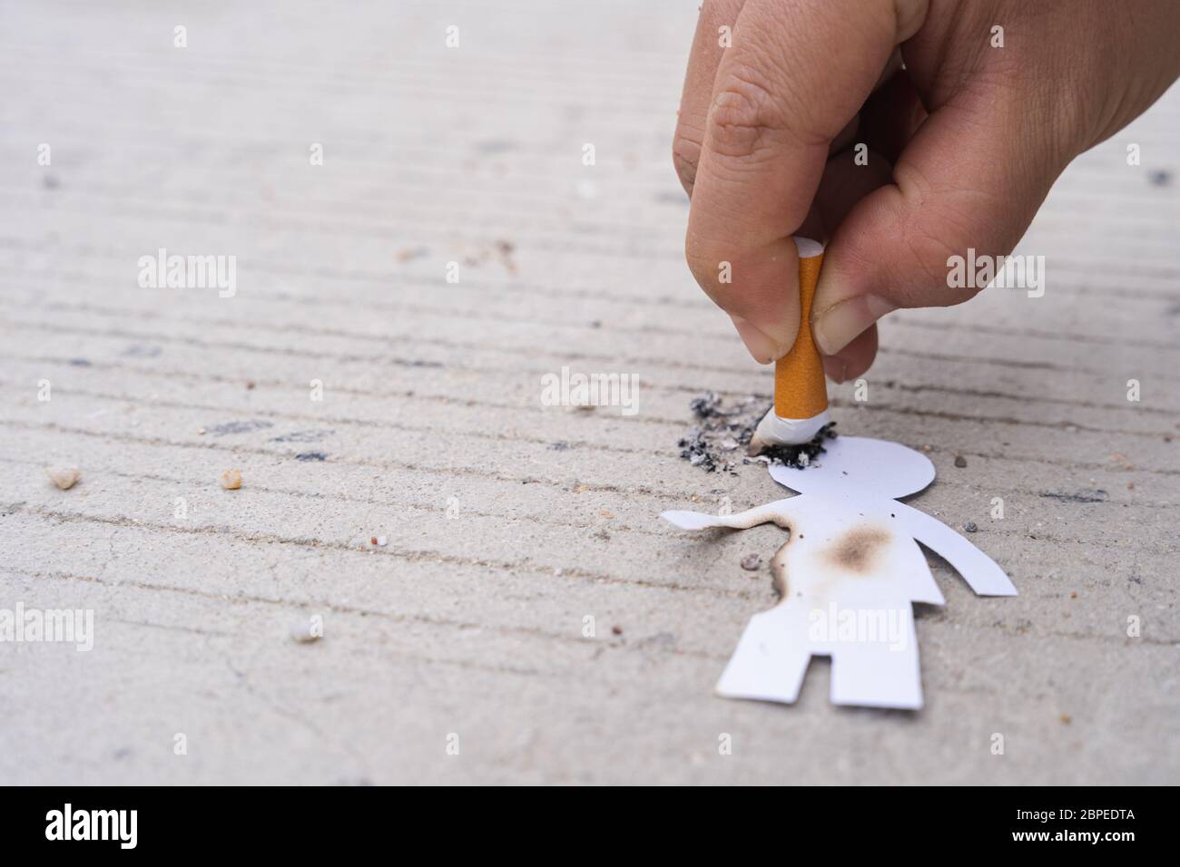Paper cut of man destroyed by cigarette. Smoking destroying life ...