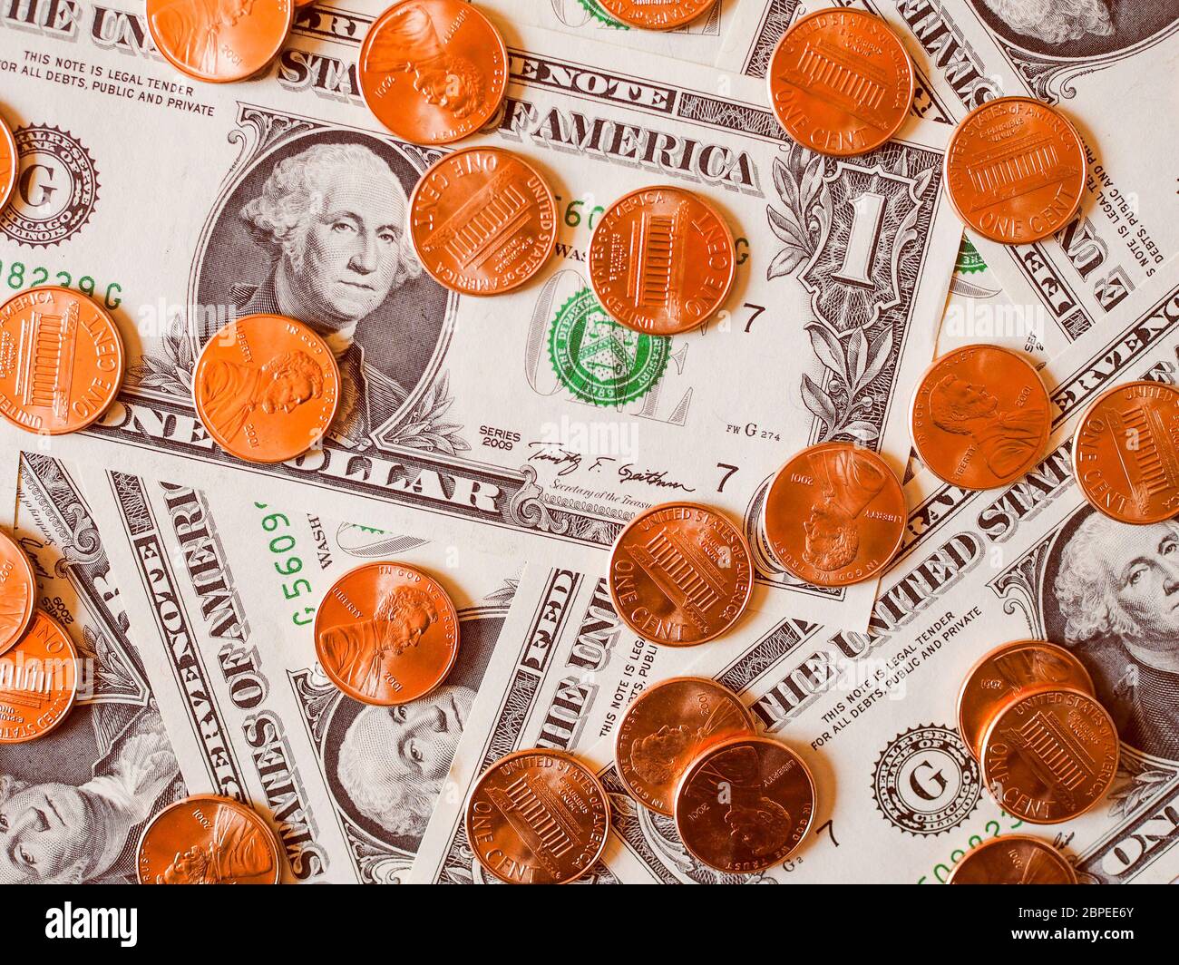 Vintage looking One cent coins and One Dollar banknotes currency of the ...