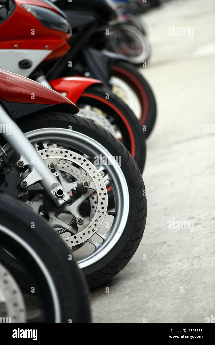 Color close up of some motorcycle wheels Stock Photo - Alamy