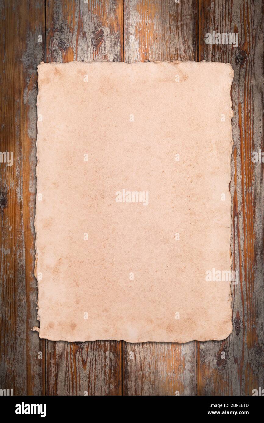 Antique blank parchment on very aged wood Stock Photo - Alamy