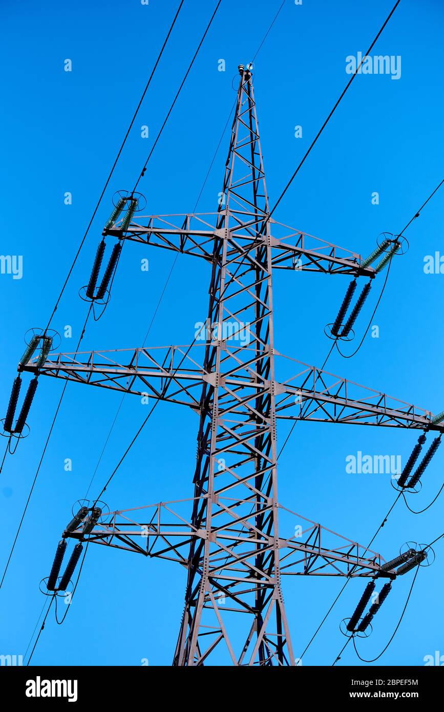 Pillar overhead power line.High voltage power lines against the ...