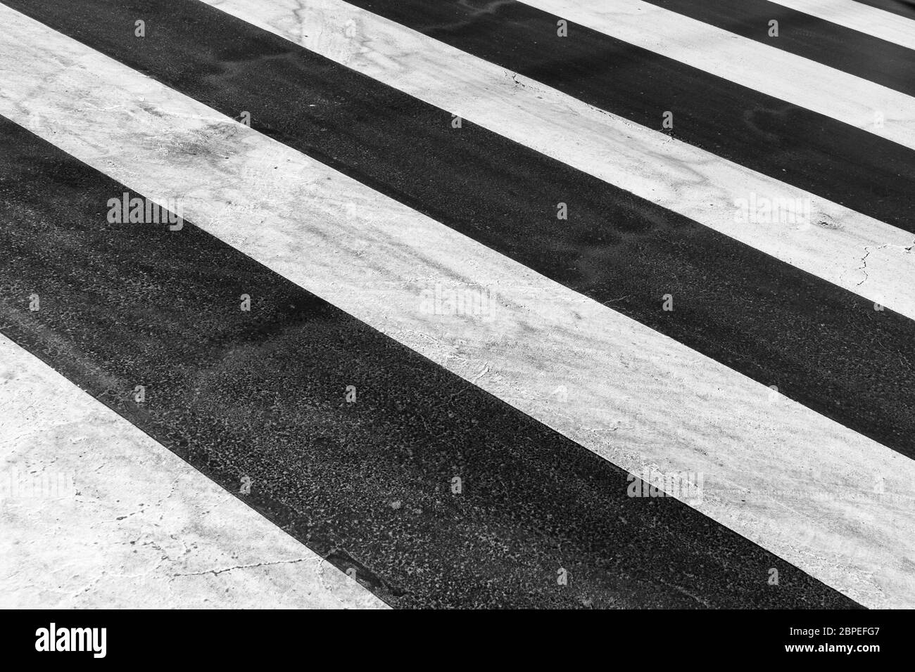 White painted pedestrian crossing on the road Stock Photo - Alamy