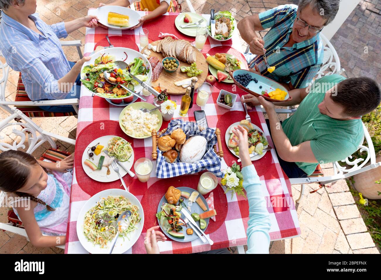 Three generation family enjoying lunch hi-res stock photography and ...