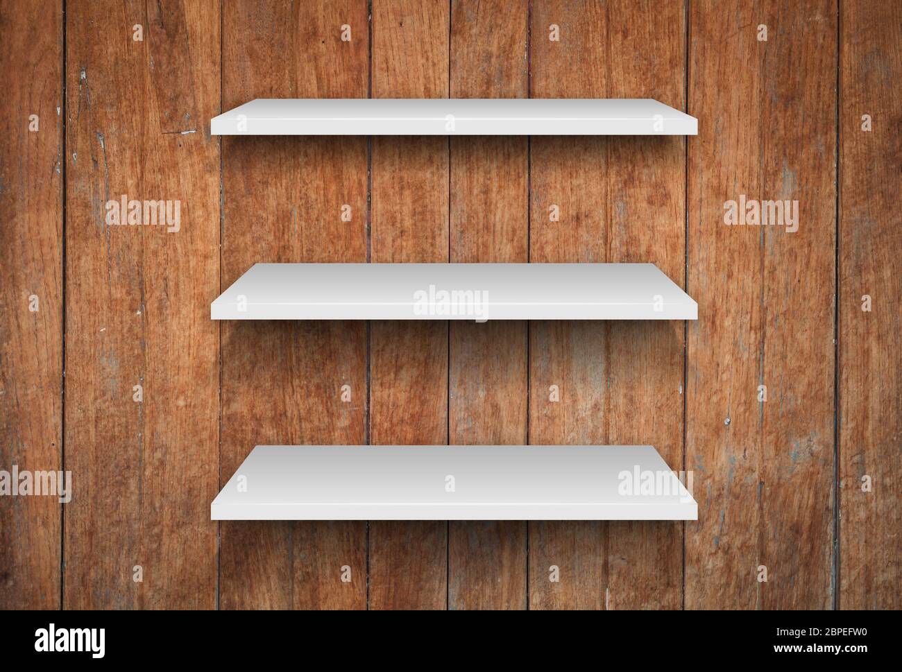 Three white shelves on wooden interior texture background, stock photo ...