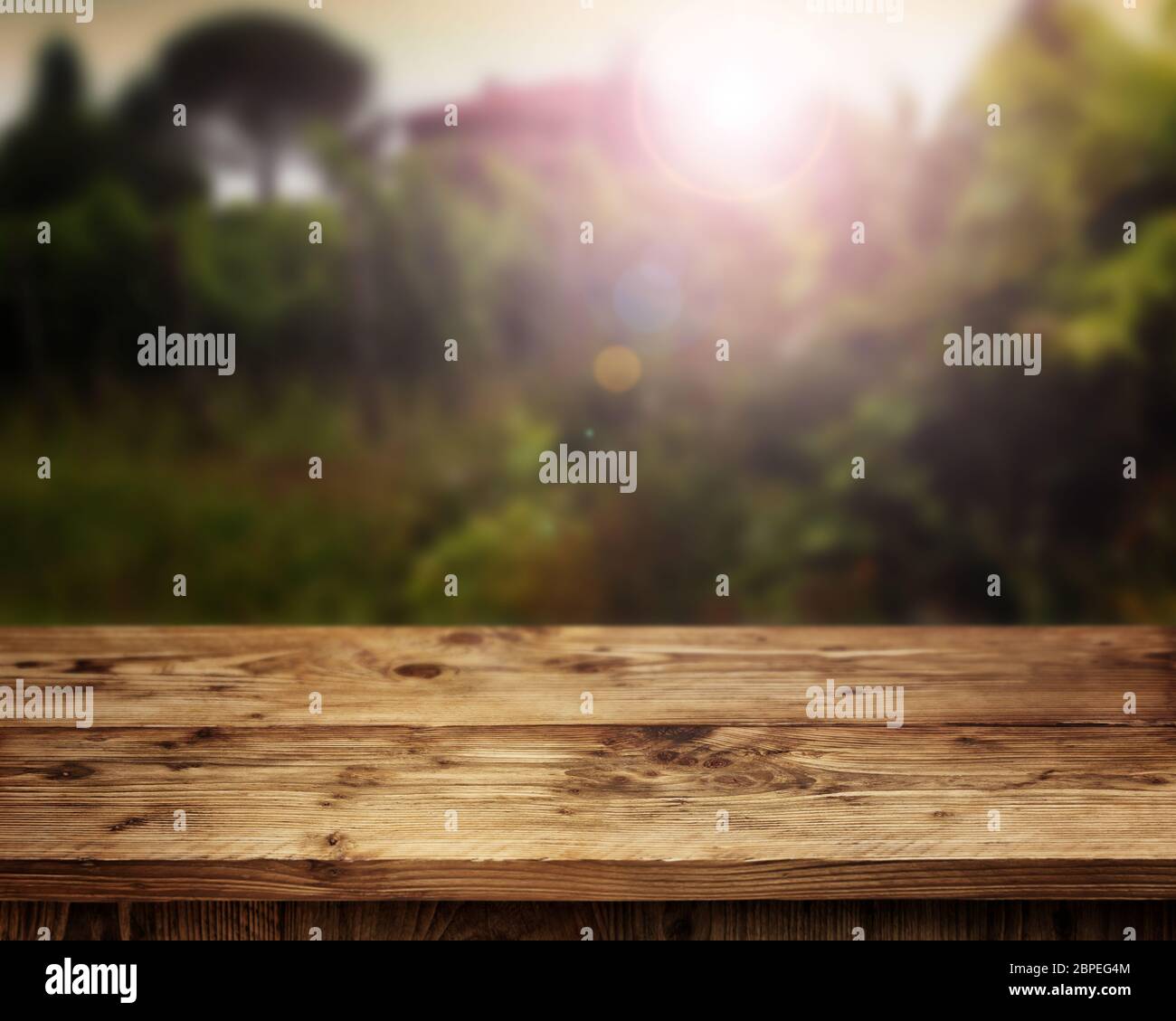 Rustic wooden table in front of a vineyard in Tuscany Stock Photo - Alamy