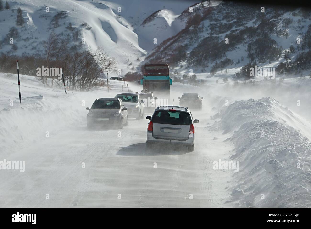 Bus cars driving on snow hi-res stock photography and images - Alamy